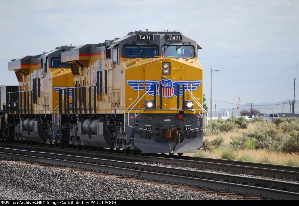 In the Crew Cab shot of a Very Brand New C45ACCTE as UP 7471 leads her Sister UP 7499 a Newer ...